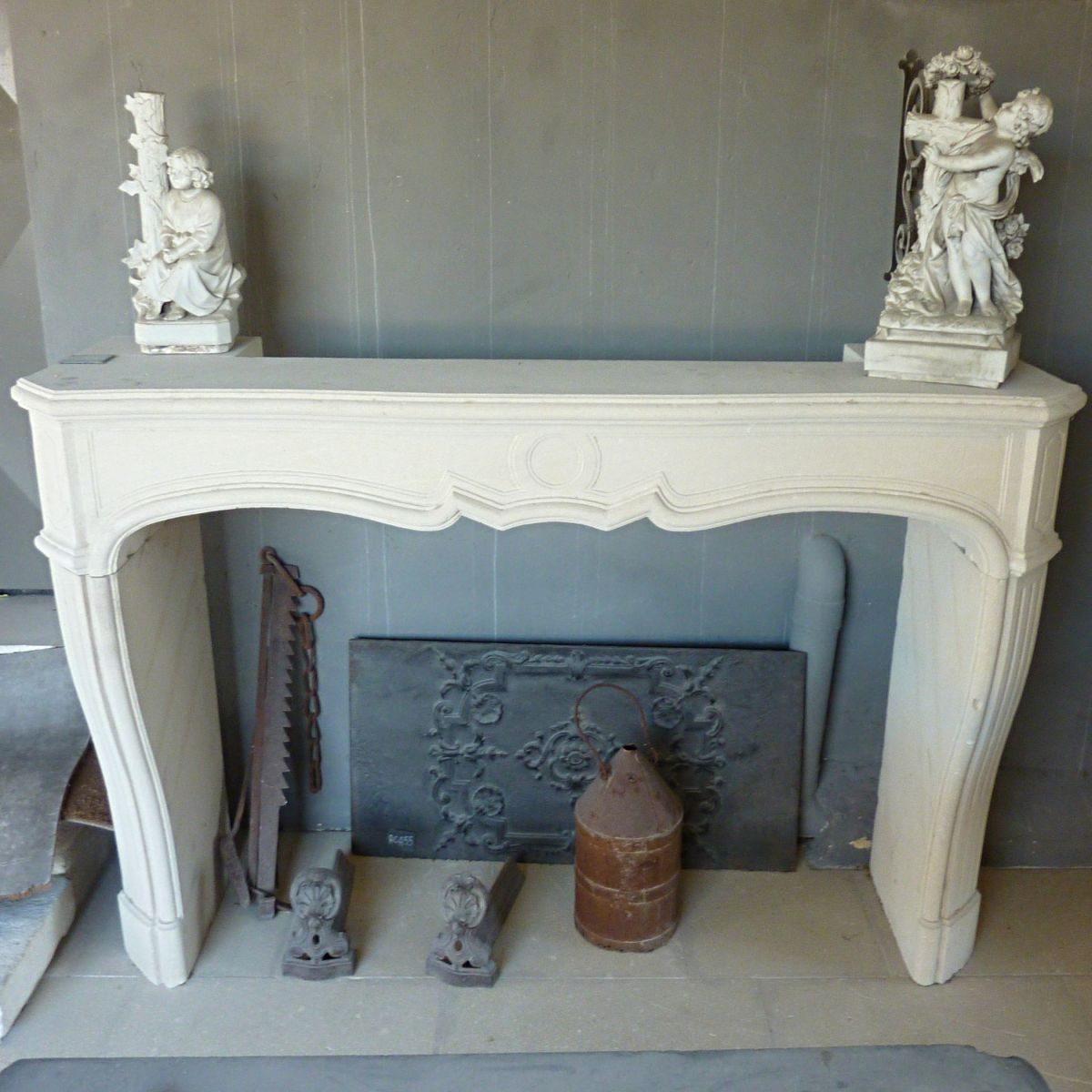 Cheminée en pierre de styles Louis XV & Louis XVI - réalisation unique