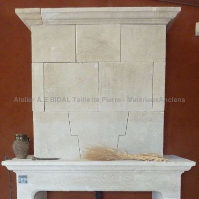 Provence-style stone fireplace with overmantel crafted in Provence