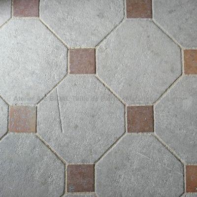 Octagonal paving of natural stone with cabochons A Bidal