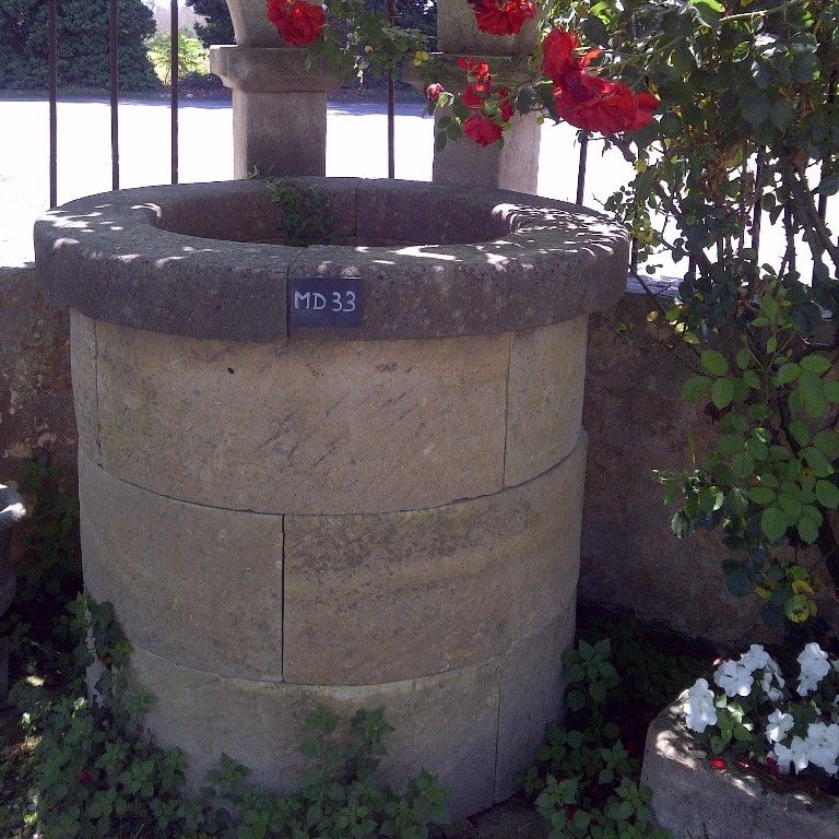 Puits en pierre réalisé en pierre naturelle par Atelier Bidal