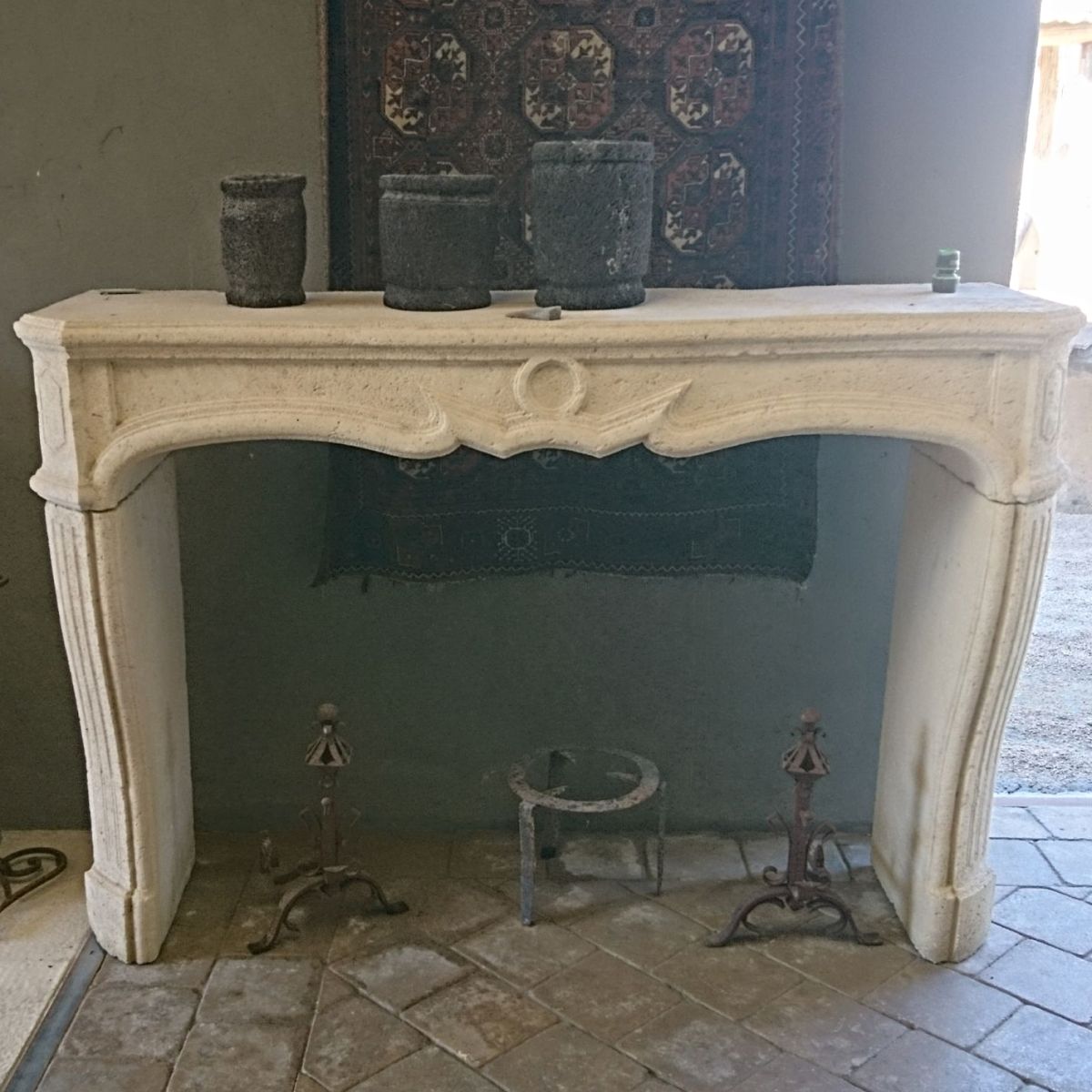 Superb Louis XV fireplace in Provence's stone : a classic mantelpiece
