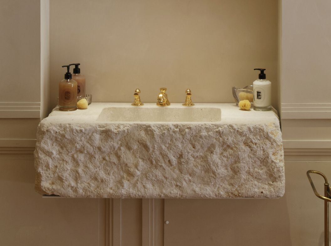 Customized sinks hand-carved in natural French limestone in Provence