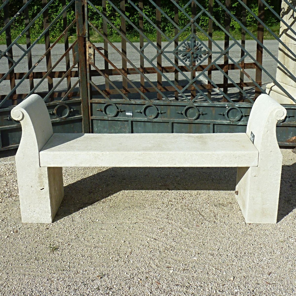 Carved stone bench with armrests, a beautiful and sturdy furniture