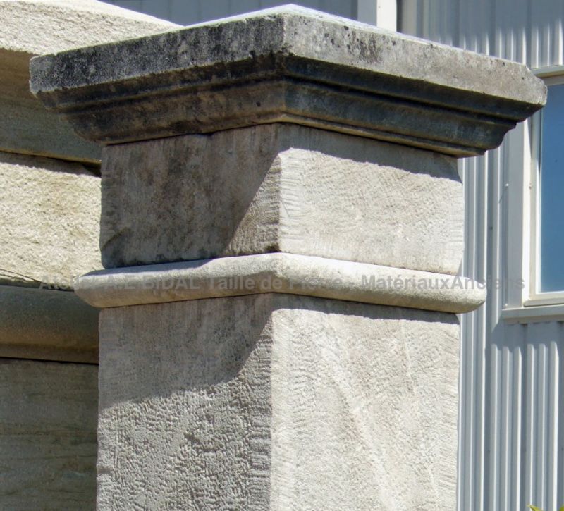 Superb pair of hand-carved limestone pillars with wheel protectors